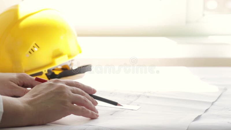 Architect Working on Blueprint, with Architectural Project at ...