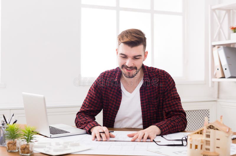 Architect Working on Blueprint in Office Stock Image - Image of ...