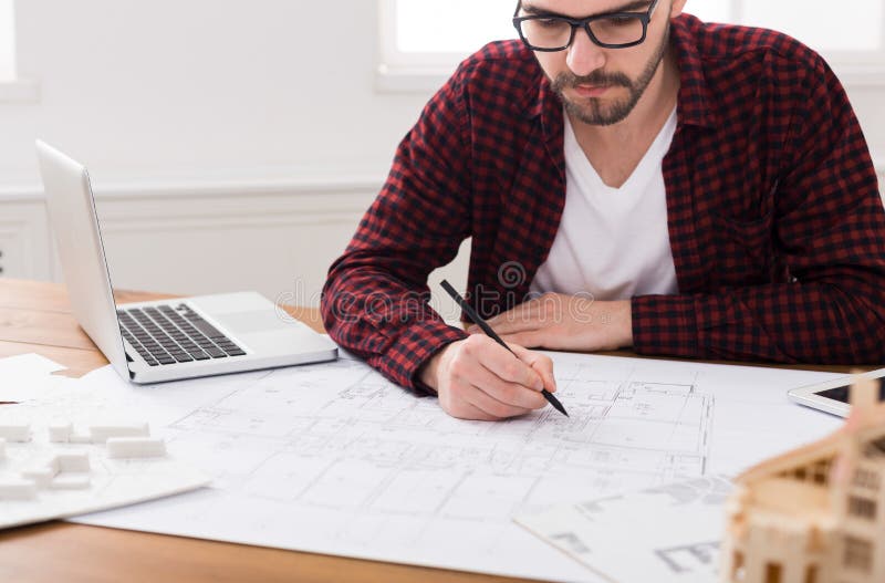 Architect Working on Blueprint in Office Stock Photo - Image of ...