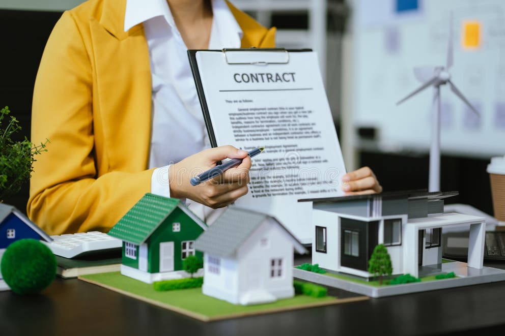 Architect Working with Blueprints for Sketching a Construction Project ...
