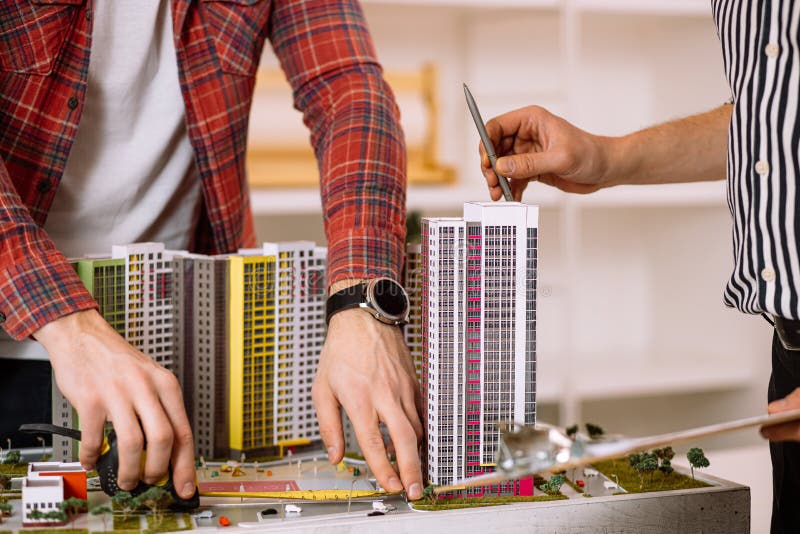 Architect Working with Building Model in Office Stock Photo - Image of ...