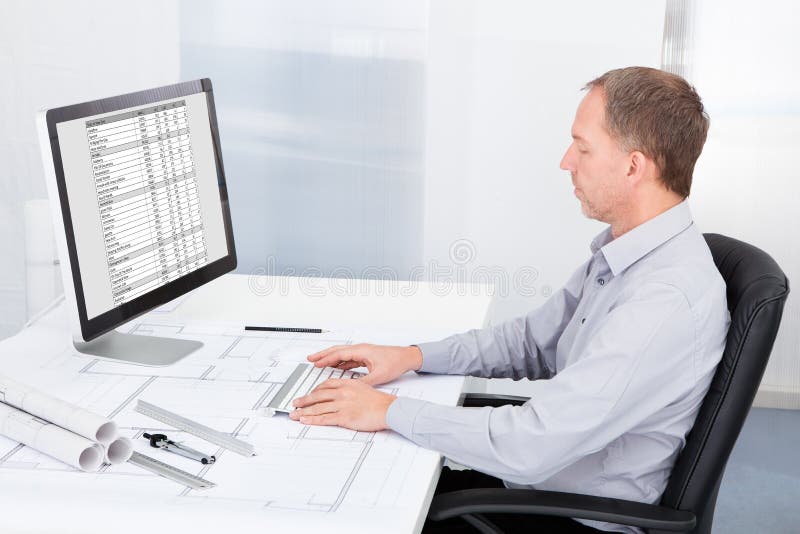 Female Architect Surfing House on Computer at Desk Stock Image - Image ...
