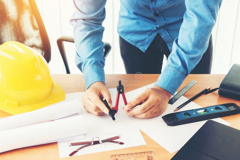 Architect Working with Construction Tools and Helmet Safety on Wooden ...