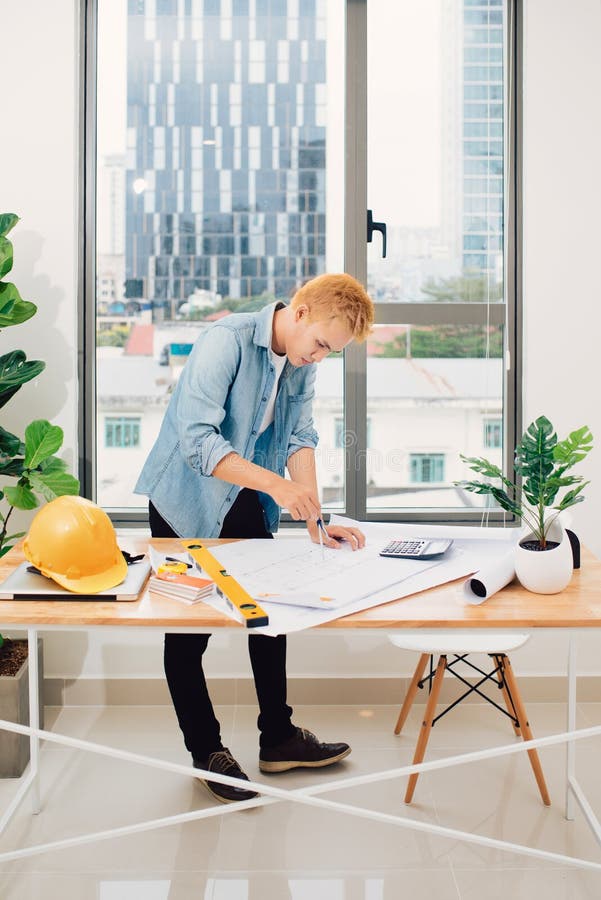 Architect Working on Drawing Table in Office Stock Image - Image of ...