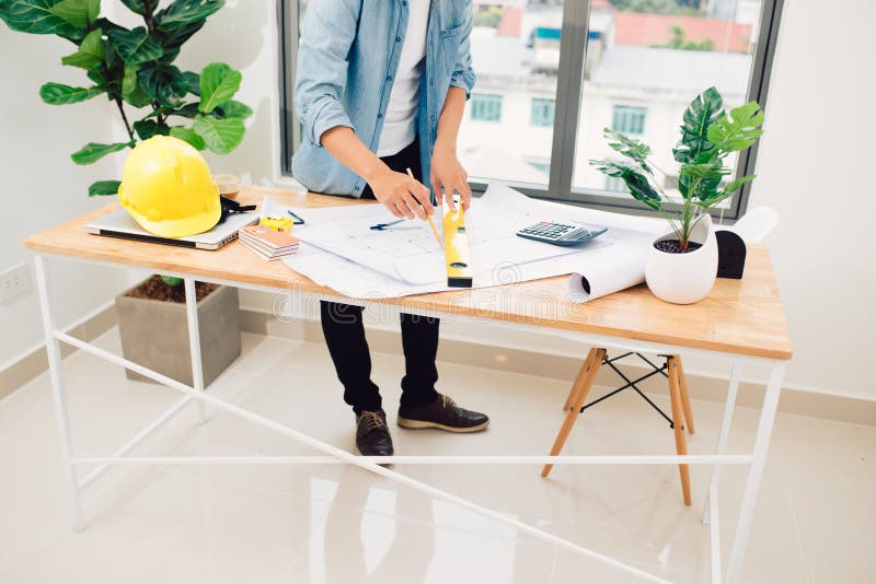 Architect Working on Drawing Table in Office Stock Photo - Image of ...