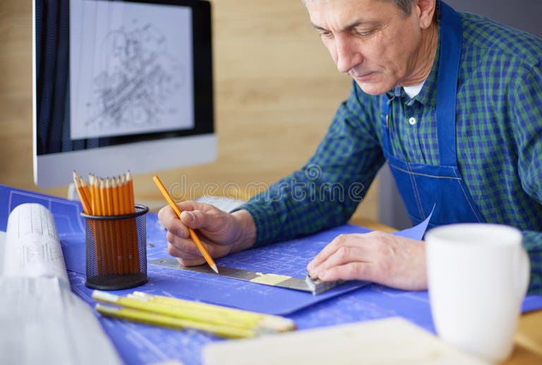 Architect Working on Drawing Table in Office Stock Photo - Image of ...