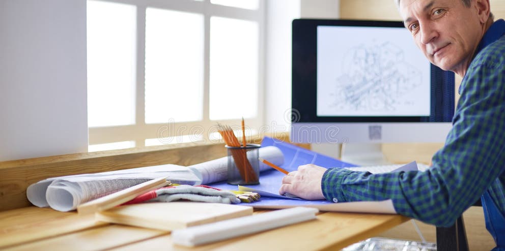 Architect Working on Drawing Table in Office Stock Image - Image of ...