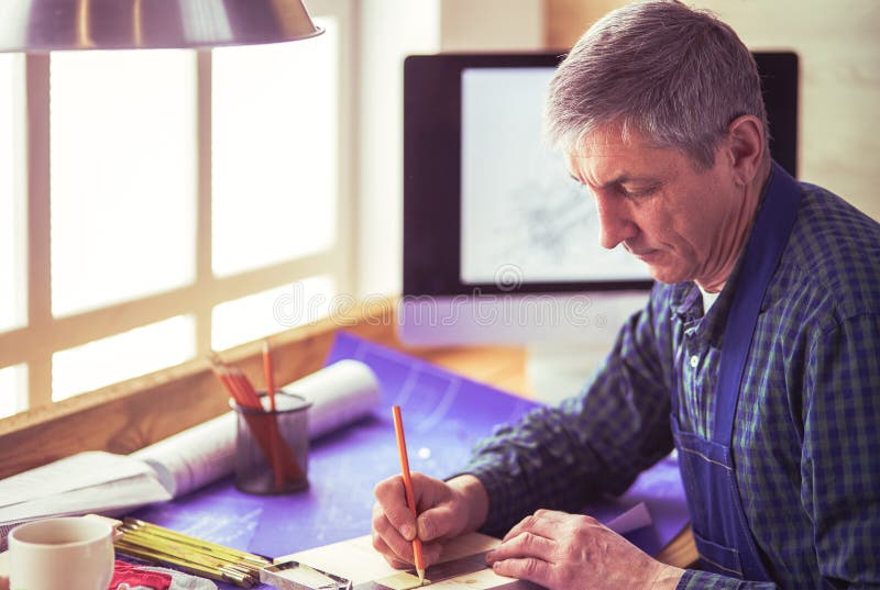 Architect Working on Drawing Table in Office Stock Photo - Image of ...