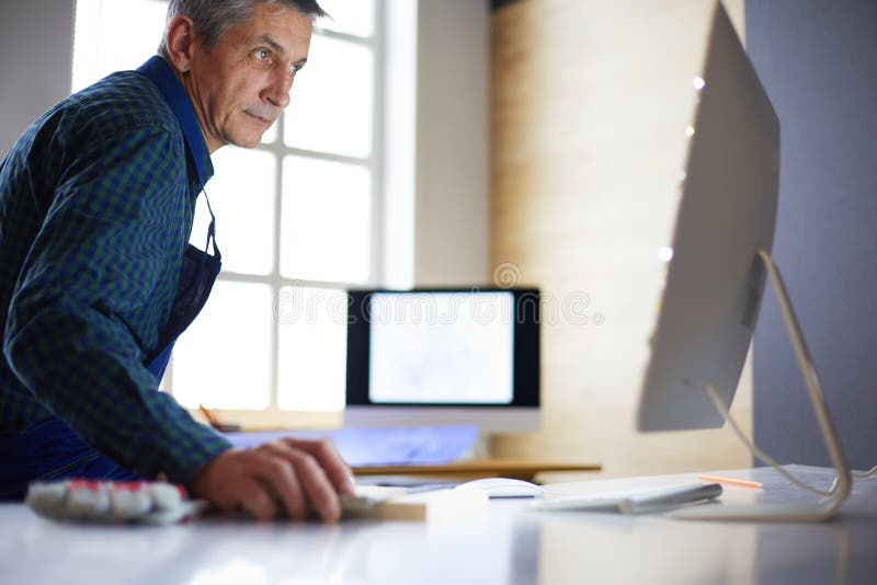 Architect Working on Drawing Table in Office Stock Photo - Image of ...