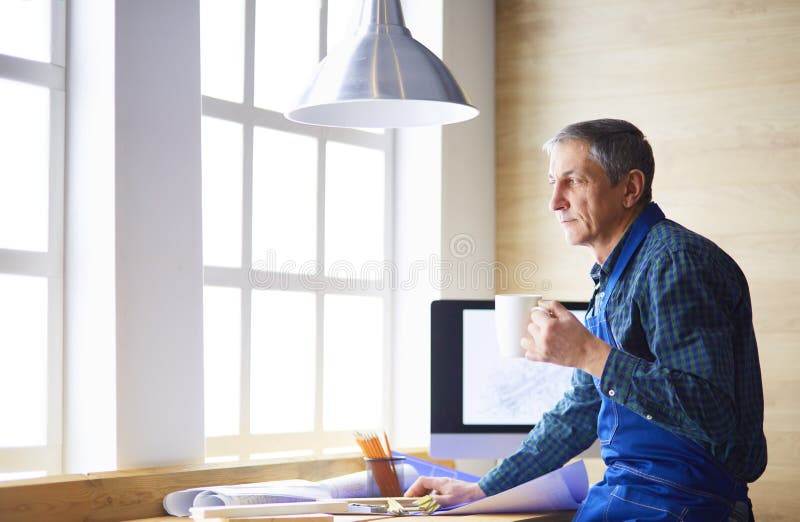 Architect Working on Drawing Table in Office Stock Photo - Image of ...