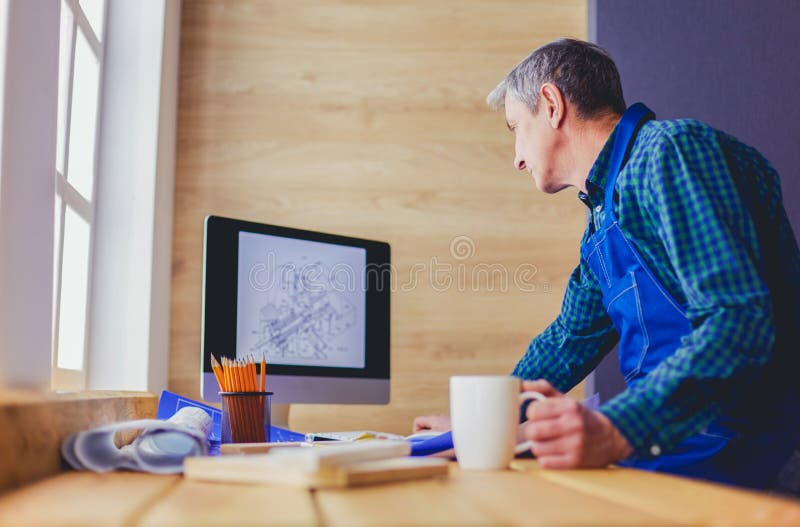 Architect Working on Drawing Table in Office Stock Image - Image of ...