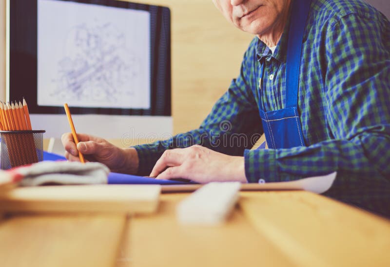 Architect Working on Drawing Table in Office Stock Image - Image of ...