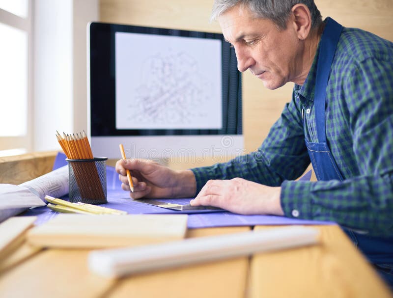 Architect Working on Drawing Table in Office Stock Photo - Image of ...
