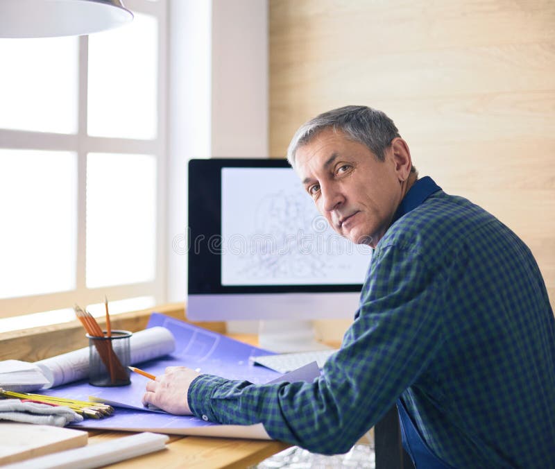 Architect Working on Drawing Table in Office Stock Photo - Image of ...