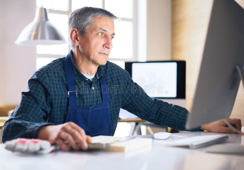Architect Working on Drawing Table in Office Stock Photo - Image of ...