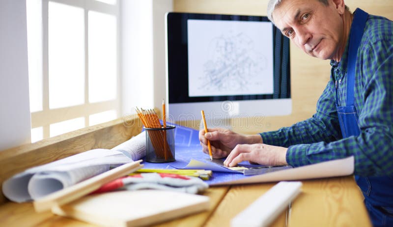 Architect Working on Drawing Table in Office Stock Image - Image of ...