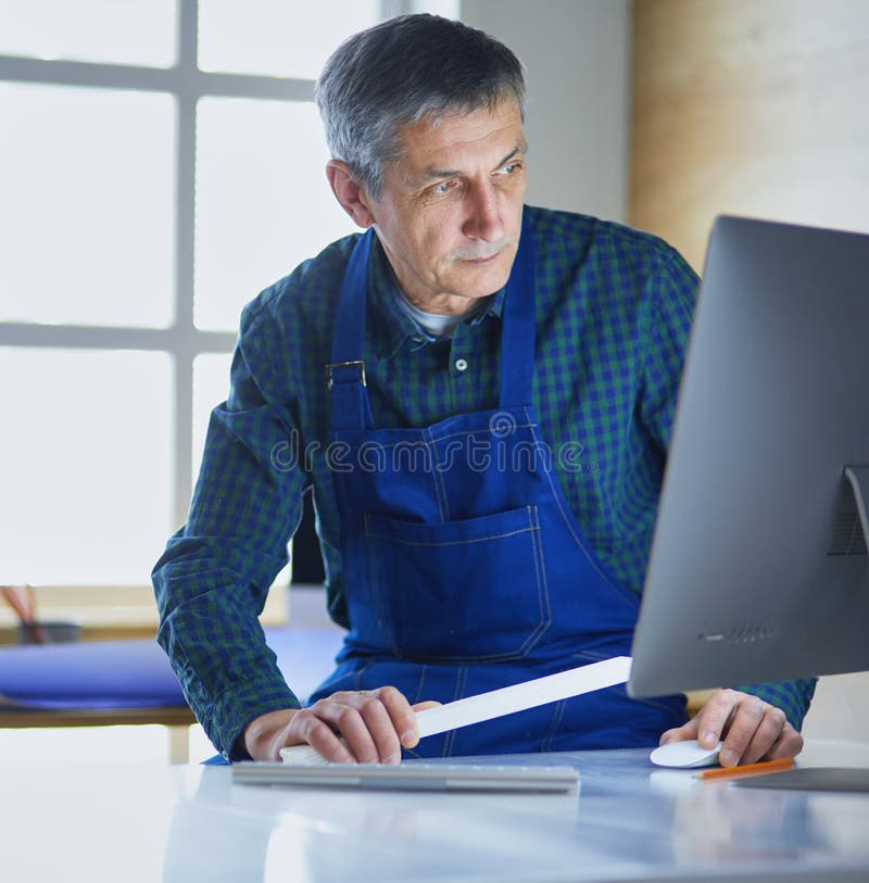 Architect Working on Drawing Table in Office Stock Image - Image of ...