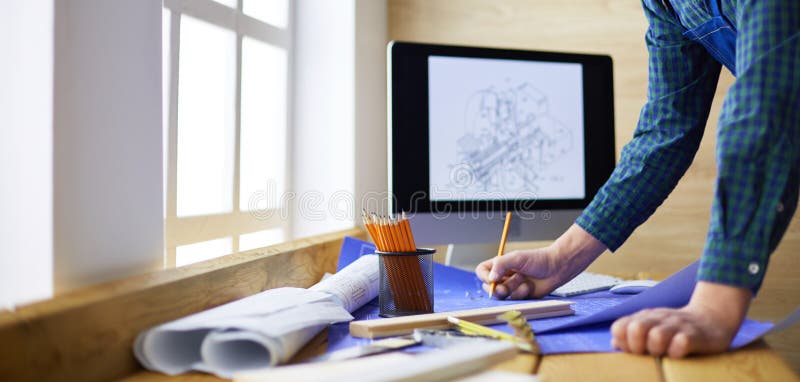 Architect Working on Drawing Table in Office Stock Image - Image of ...