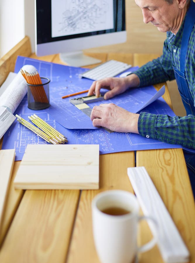 Architect Working on Drawing Table in Office Stock Photo - Image of ...
