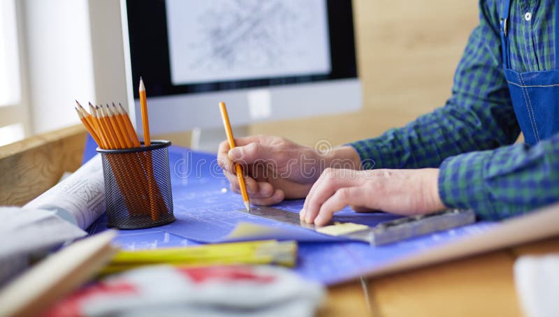 Architect Working on Drawing Table in Office Stock Image - Image of ...