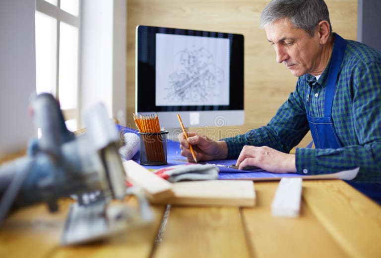 Architect Working on Drawing Table in Office Stock Photo - Image of ...