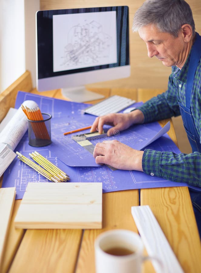 Architect Working on Drawing Table in Office Stock Image - Image of ...