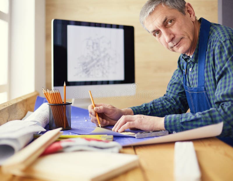 Architect Working on Drawing Table in Office Stock Image - Image of ...