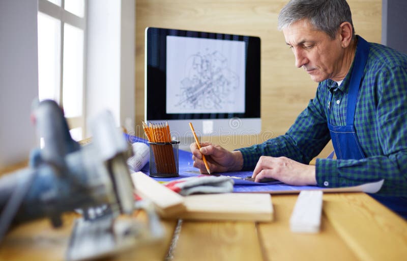 Architect Working on Drawing Table in Office Stock Image - Image of ...