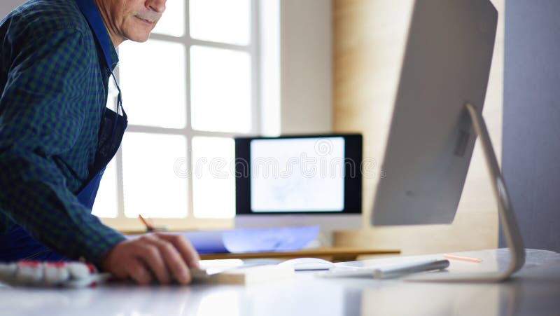 Architect Working on Drawing Table in Office Stock Photo - Image of ...