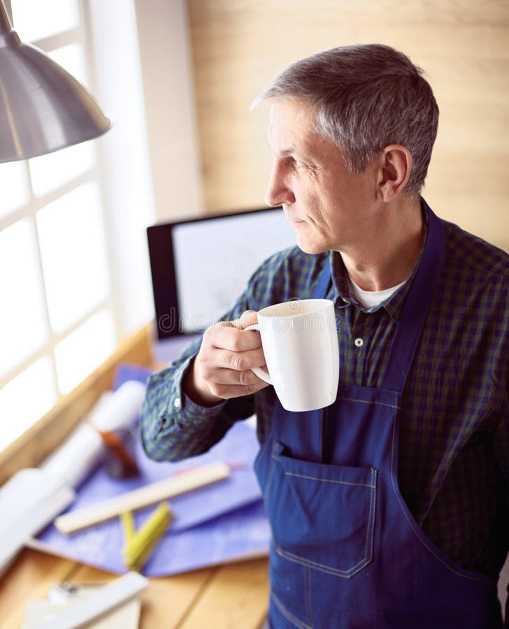 Architect Working on Drawing Table in Office Stock Photo - Image of ...
