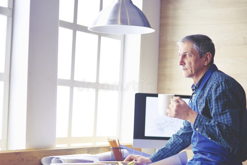 Architect Working on Drawing Table in Office Stock Photo - Image of ...