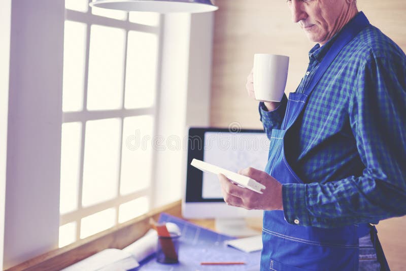 Architect Working on Drawing Table in Office Stock Photo - Image of ...