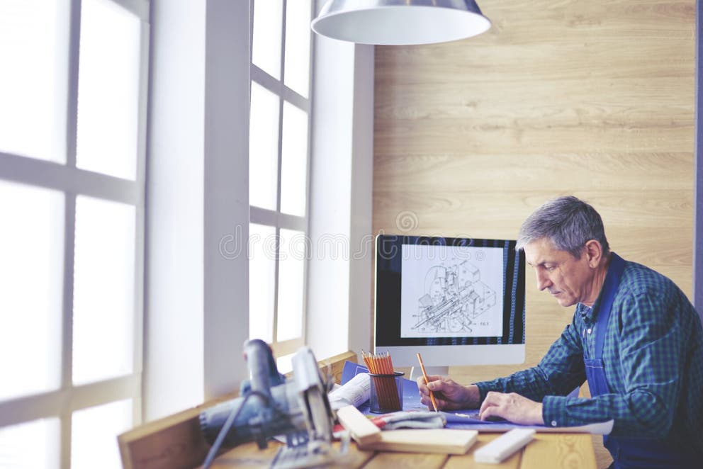 Architect Working on Drawing Table in Office Stock Image - Image of ...