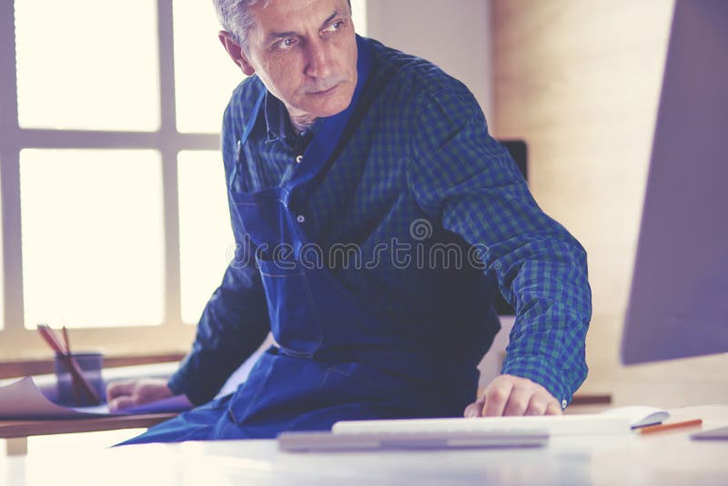 Architect Working on Drawing Table in Office Stock Image - Image of ...