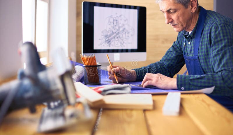 Architect Working on Drawing Table in Office Stock Photo - Image of ...