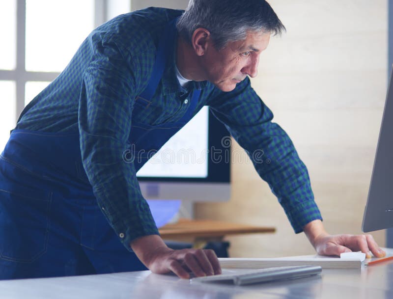 Architect Working on Drawing Table in Office Stock Image - Image of ...