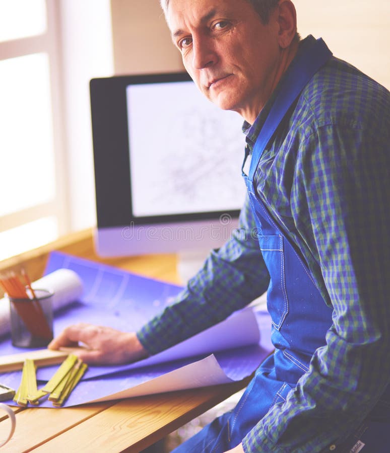 Architect Working on Drawing Table in Office Stock Photo - Image of ...