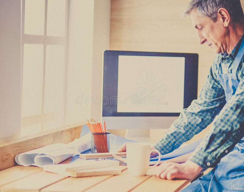 Architect Working on Drawing Table in Office Stock Photo - Image of ...