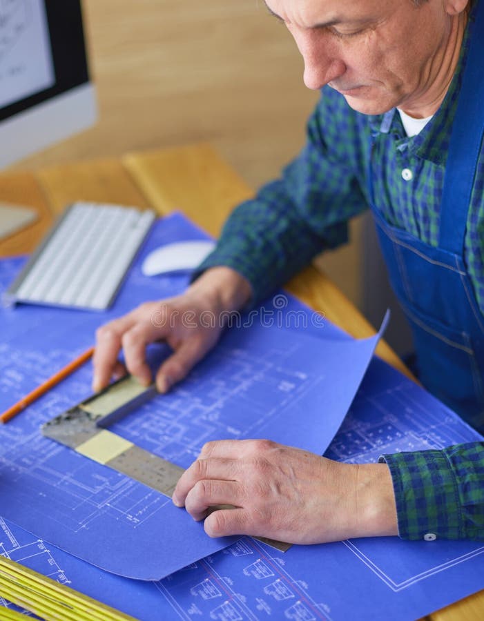 Architect Working on Drawing Table in Office Stock Photo - Image of ...