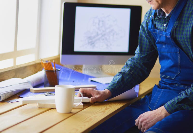 Architect Working on Drawing Table in Office Stock Photo - Image of ...