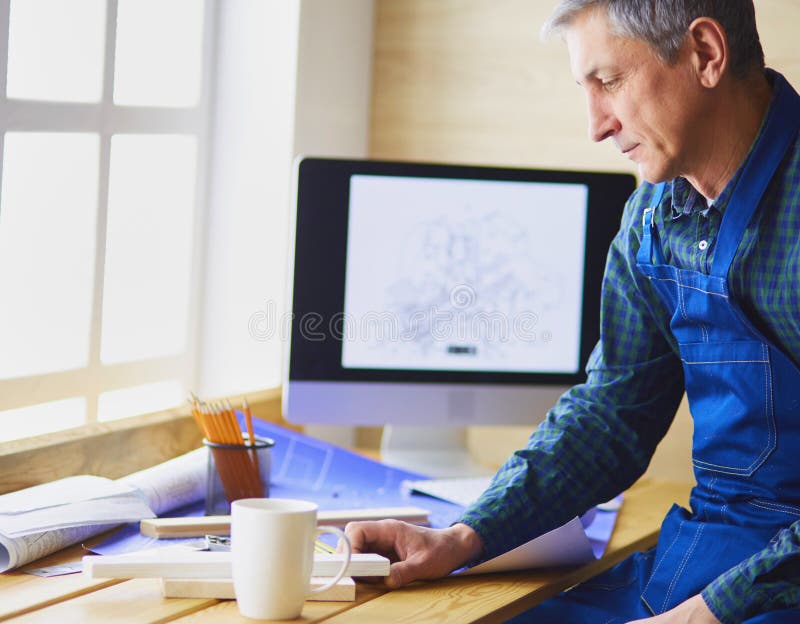 Architect Working on Drawing Table in Office Stock Image - Image of ...