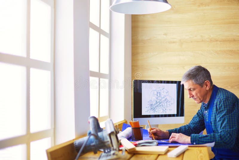 Architect Working on Drawing Table in Office Stock Photo - Image of ...