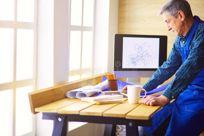 Architect Working on Drawing Table in Office Stock Photo - Image of ...