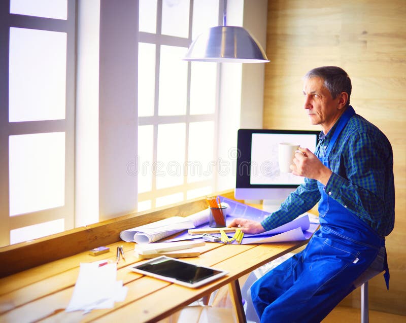 Architect Working on Drawing Table in Office Stock Photo - Image of ...