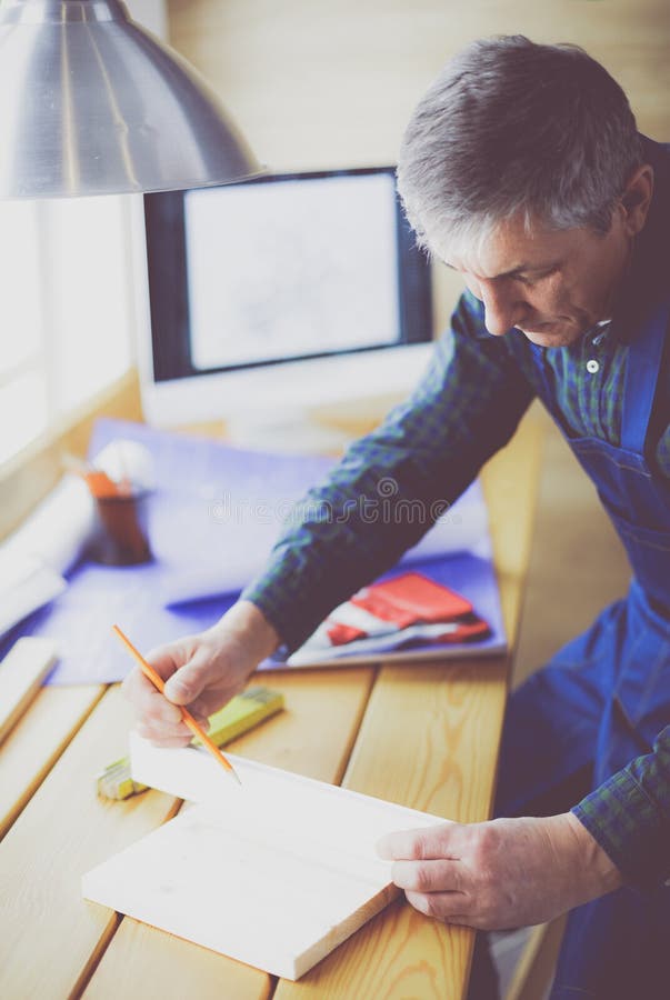 Architect Working on Drawing Table in Office Stock Photo - Image of ...