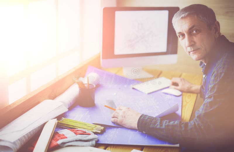 Architect Working on Drawing Table in Office Stock Image - Image of ...