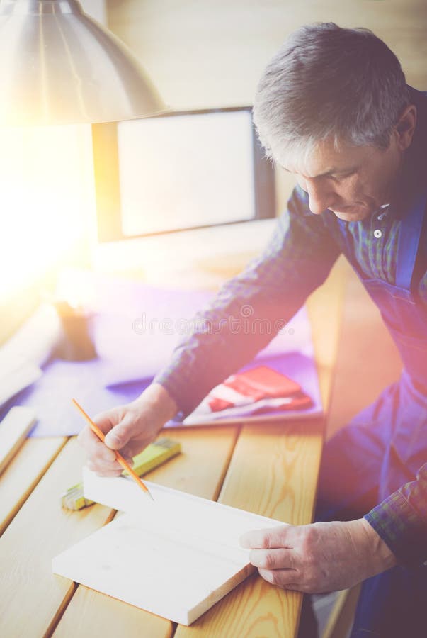 Architect Working on Drawing Table in Office Stock Photo - Image of ...