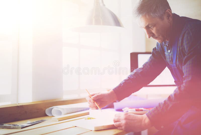 Architect Working on Drawing Table in Office Stock Image - Image of ...