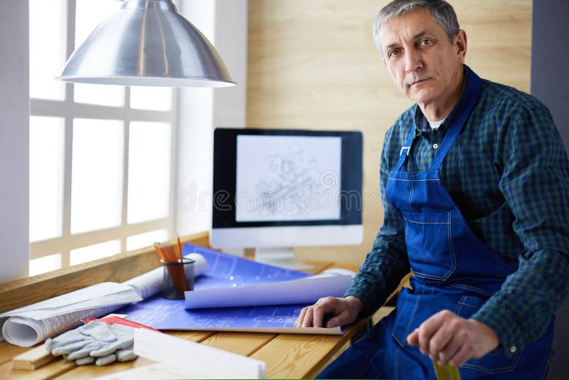 Architect Working on Drawing Table in Office Stock Photo - Image of ...