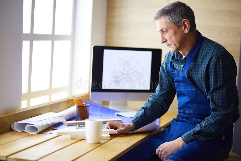 Architect Working on Drawing Table in Office Stock Image - Image of ...